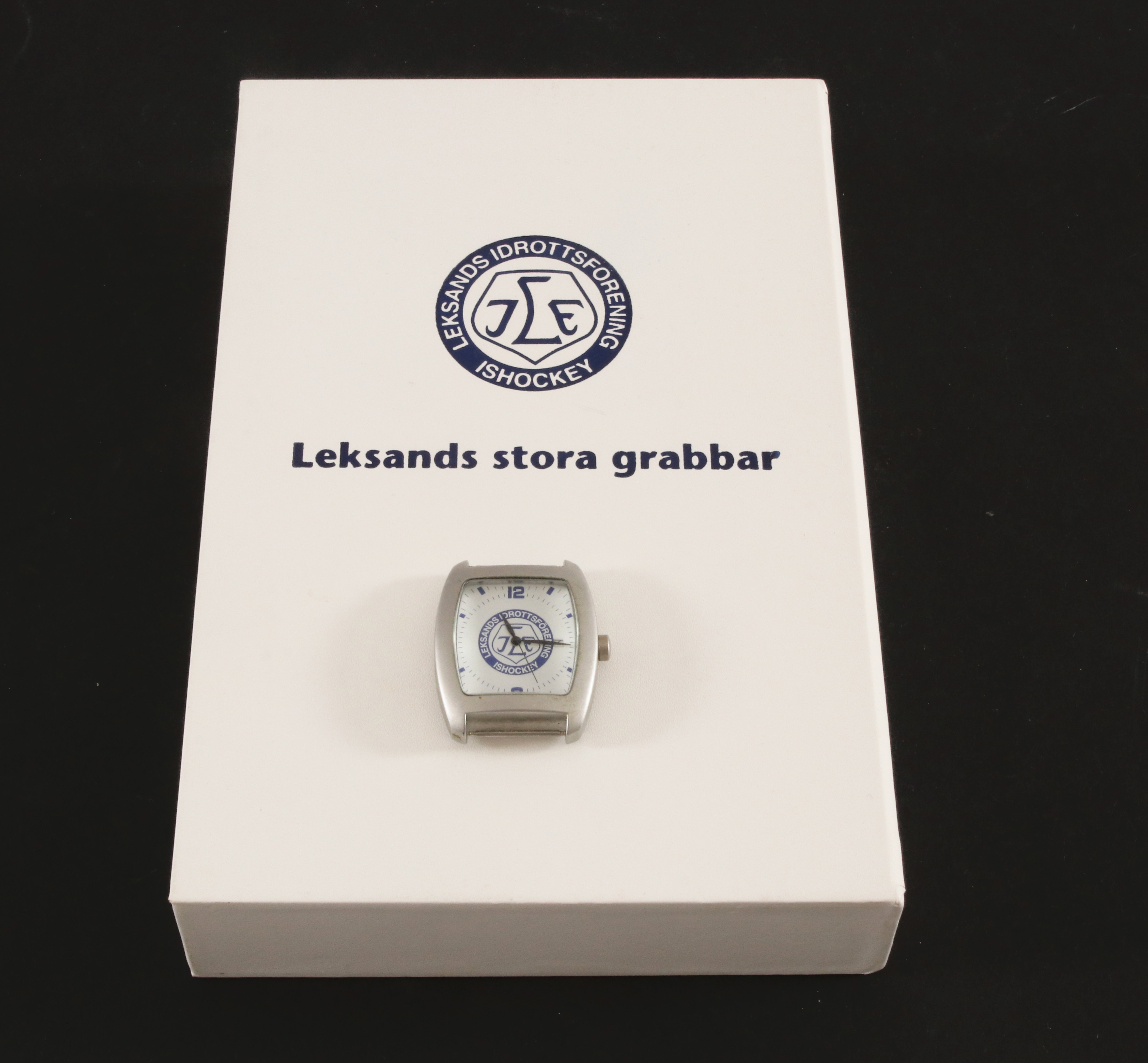 Bok med armbandsur, "Leksands Stora Grabbar" | Auktion